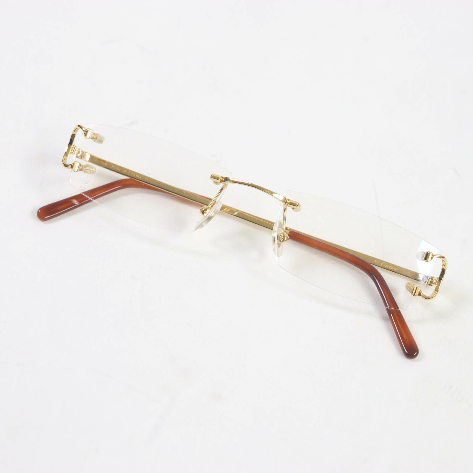 【楽天市場】未使用品 Cartier カルティエ CT00920 ドゥーブルC リムレス ツーポイント メガネ 眼鏡 アイウェア ゴールド ...