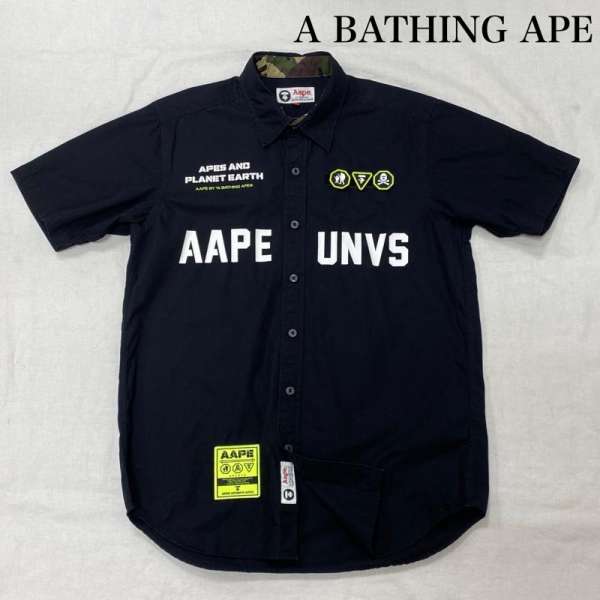 【楽天市場】A BATHING APE アベイシングエイプ 半袖 シャツ、ブラウス Shirt, Blouse AAPE UNVS GRAPHIC SHIRT エーエイプ ...