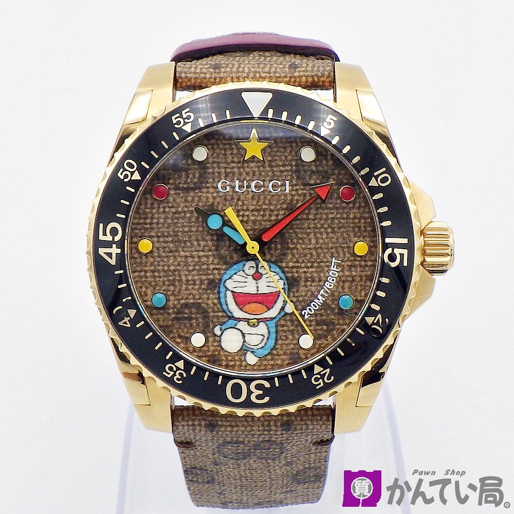 【楽天市場】【中古】GUCCI グッチ YA136335 136.9 ダイブ ドラえもん コラボ クォーツ腕時計 ゴールド×ブラック ブラウン ...