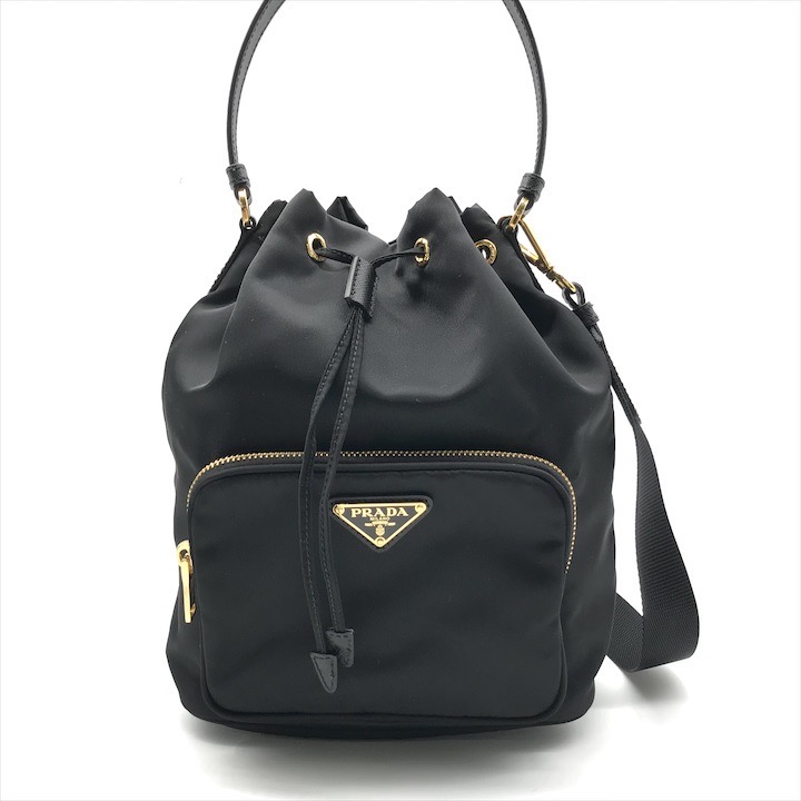【楽天市場】【中古】未使用保管品 PRADA プラダ 三角ロゴプレート ナイロン テスート 巾着 2WAY ハンド ショルダー バッグ カバン 鞄 ブラック k5419：BEGINSELL